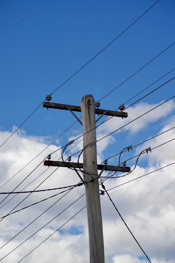 A Power Pole Against a Sunny Sky Stock Image - Image of transmission ...