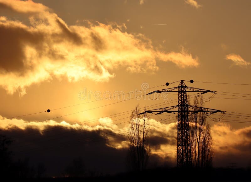 Power pole at rainy Sunset stock photo. Image of power - 266572128