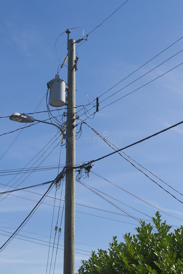 Power Pole with Street Light and Electrical Wires Stock Image - Image ...