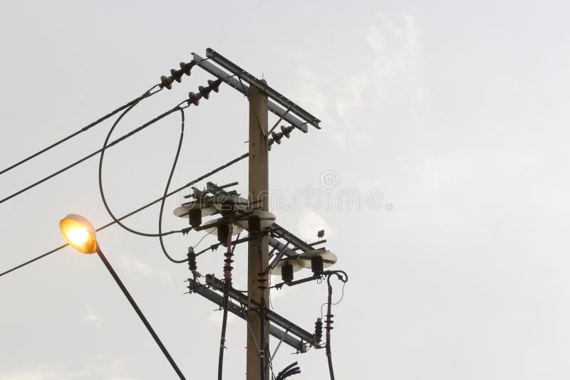 Power Poles with Lights in the Evening Stock Image - Image of energy ...