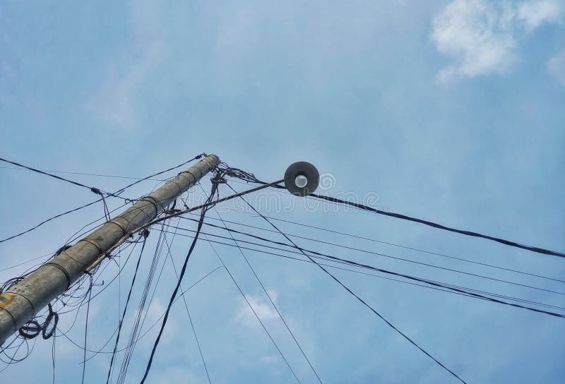 Power Poles and Power Lines with Blue and Sunny Clouds Stock Photo ...