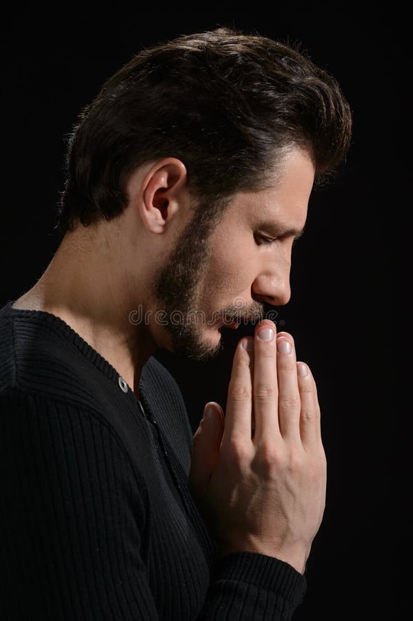 The Power of Prayer. Side View of Bearded Man Praying and Holding His ...