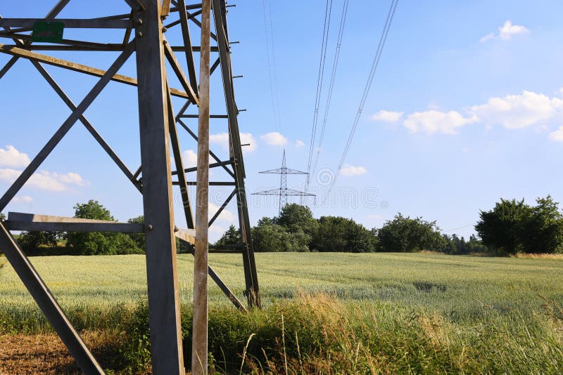 A Power Pylon in the Fields in Hohenlohe, Germany Stock Photo - Image ...