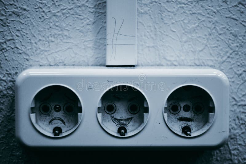 Power socket with emotions stock image. Image of discontent - 166121687