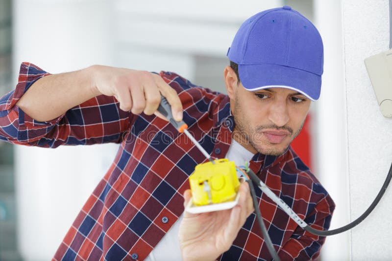 Power socket and man hands stock image. Image of fixture - 237933995