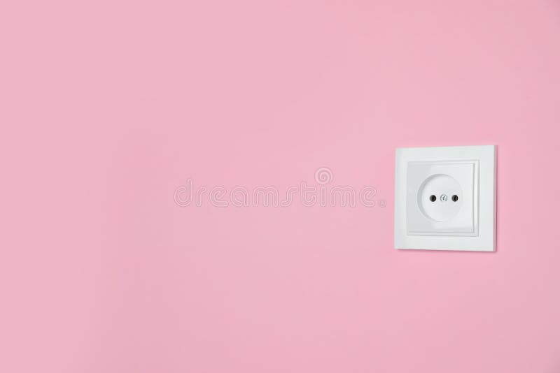 Power Socket on Pink Wall, Space for Text. Electrical Supply Stock ...