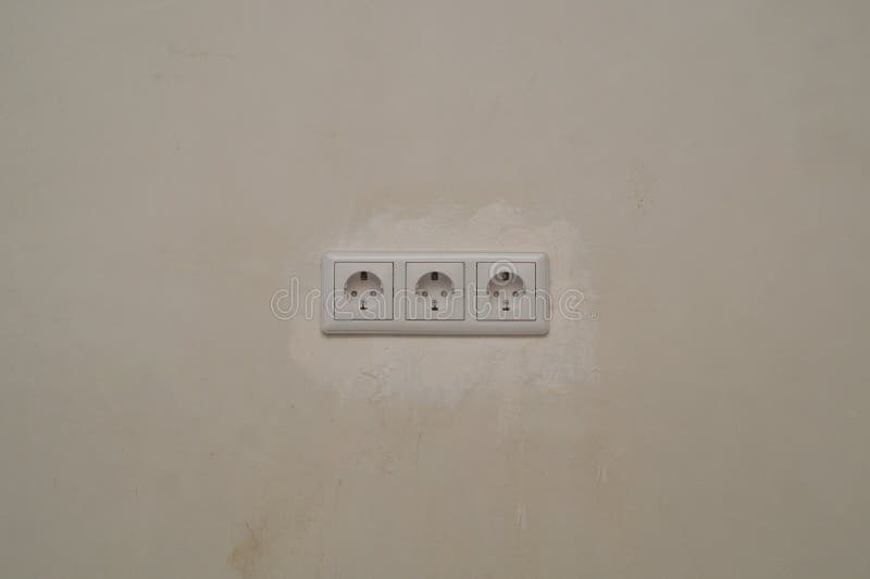 Power Socket in the Wall. Electrical Outlet Close Up. Repair Process ...