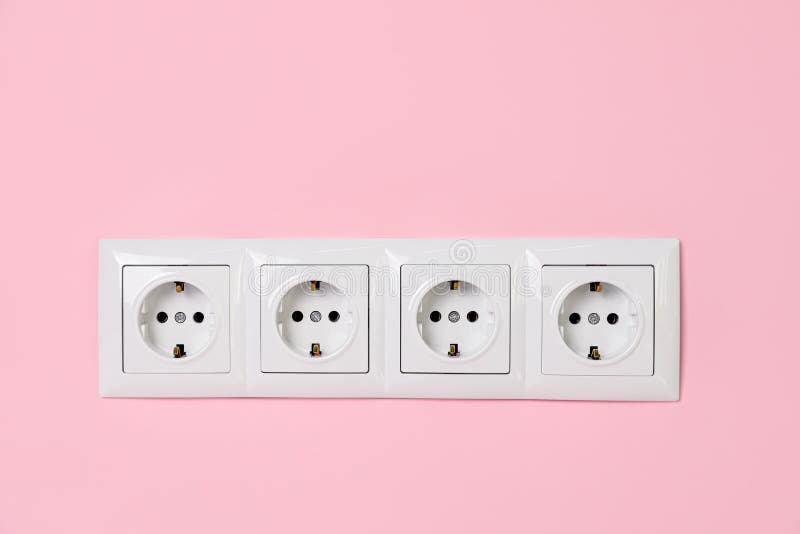 Power Sockets on Pink Wall. Electrical Supply Stock Image - Image of ...