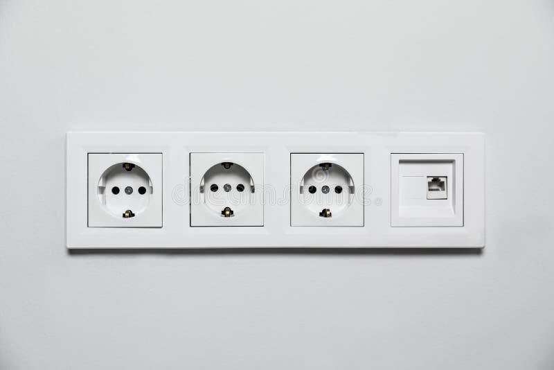 Power Sockets on White Wall. Electrical Supply Stock Image - Image of ...
