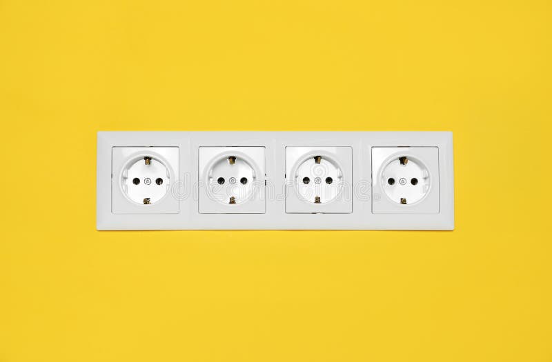 Power Sockets on Yellow Wall. Electrical Supply Stock Image - Image of ...