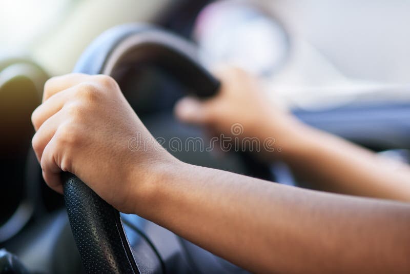 Power Steering Makes for Smooth Driving. Hands Holding Onto a Steering ...