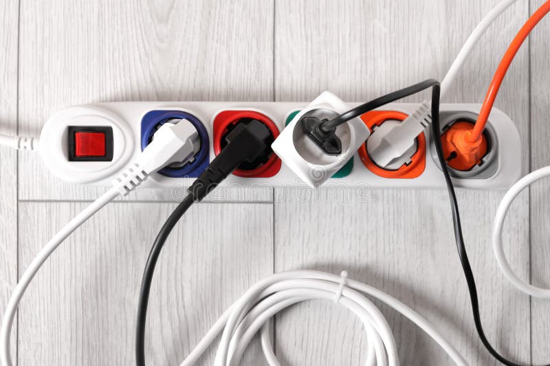 Power Strip with Different Electrical Plugs on White Laminated Floor ...