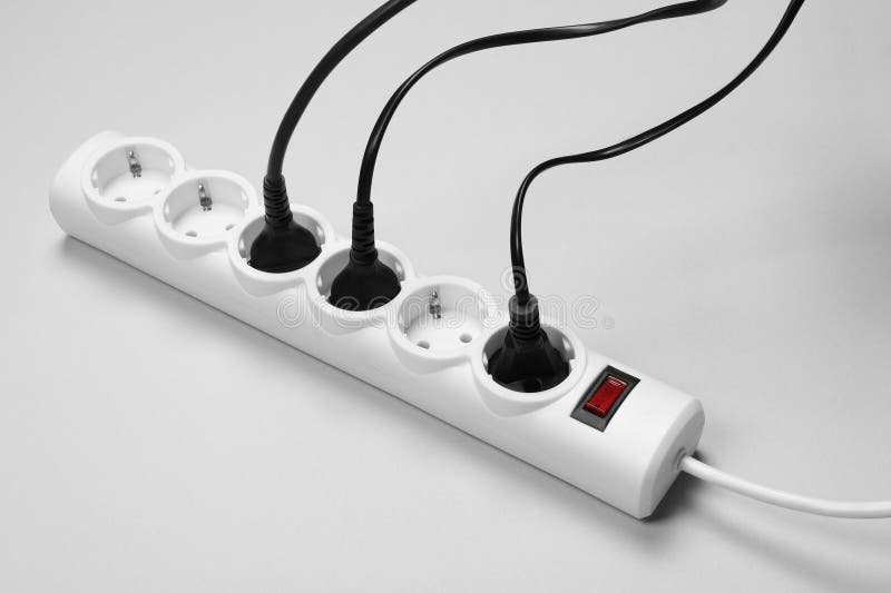 Power Strip with Different Electrical Plugs on White Laminated Floor ...