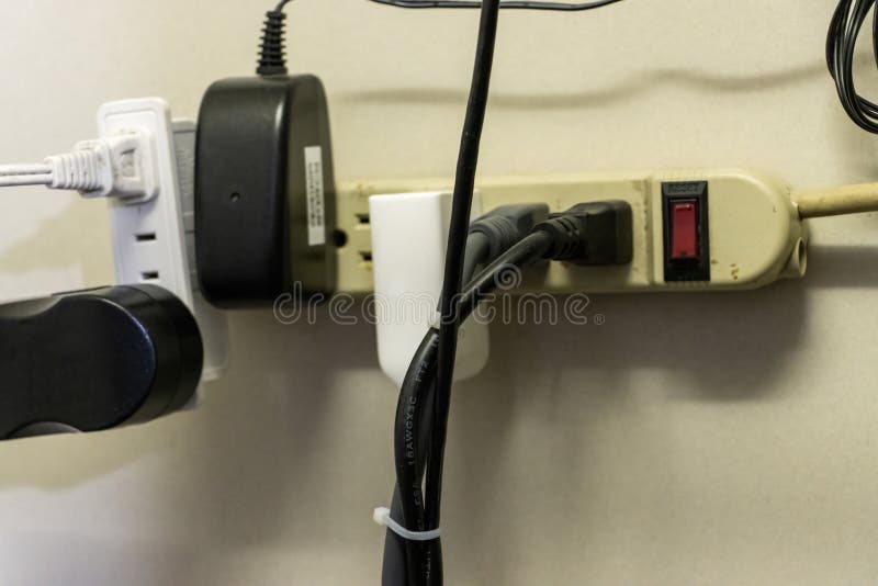Power Strip with Multiple Devices Plugged Connected Stock Image - Image ...