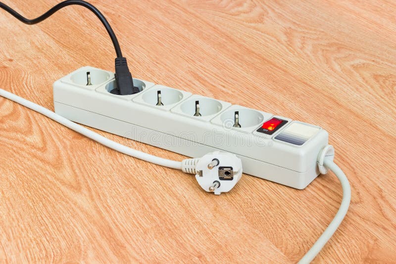 Power Strip and Two Power Plugs with Corresponding Cables Stock Photo ...