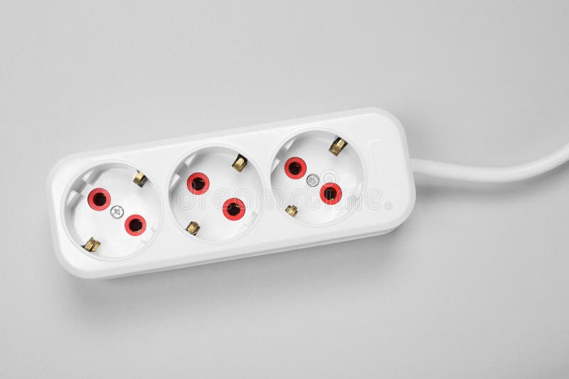 Power Strip with Different Electrical Plugs on White Laminated Floor ...