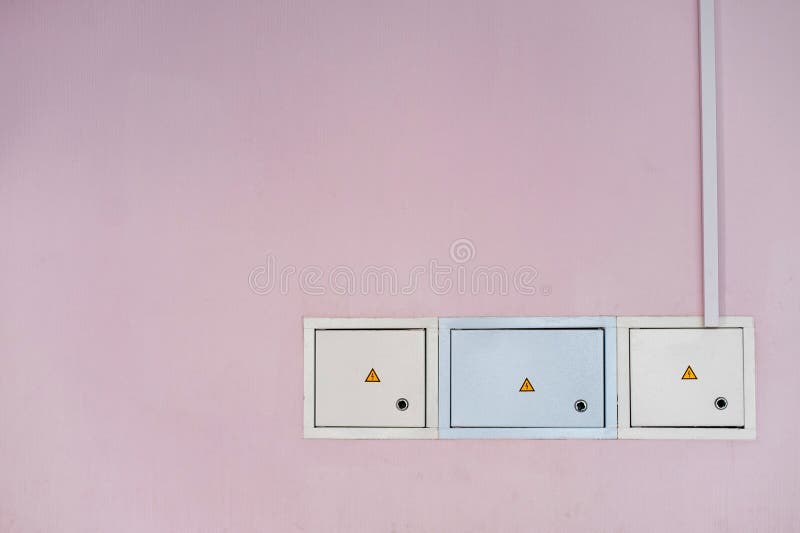 Power Supply Boxes in the Pink Wall. with Copy Space Stock Image ...