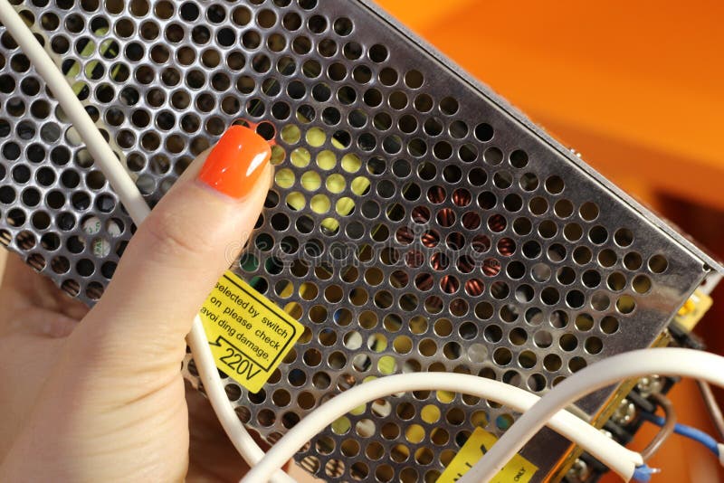 Power Supply on Orange Table Stock Image - Image of closeup, table ...