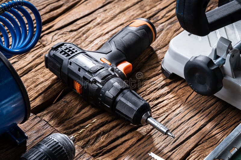Power Tools on Wooden Desk stock photo. Image of desk - 287566338