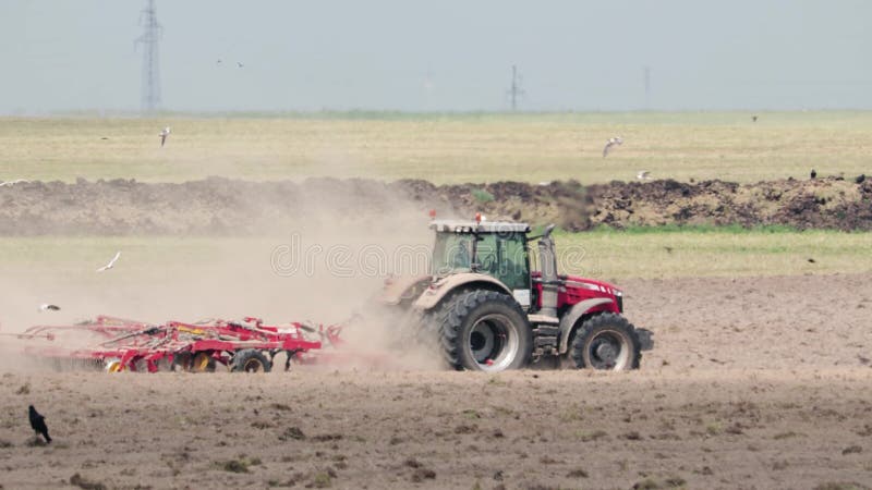 Power Tractor with Multi Function Unit Performs the Plowing ...