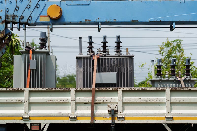 Power Transformer Strapped on Truck and Crane Arm Stock Photo - Image ...