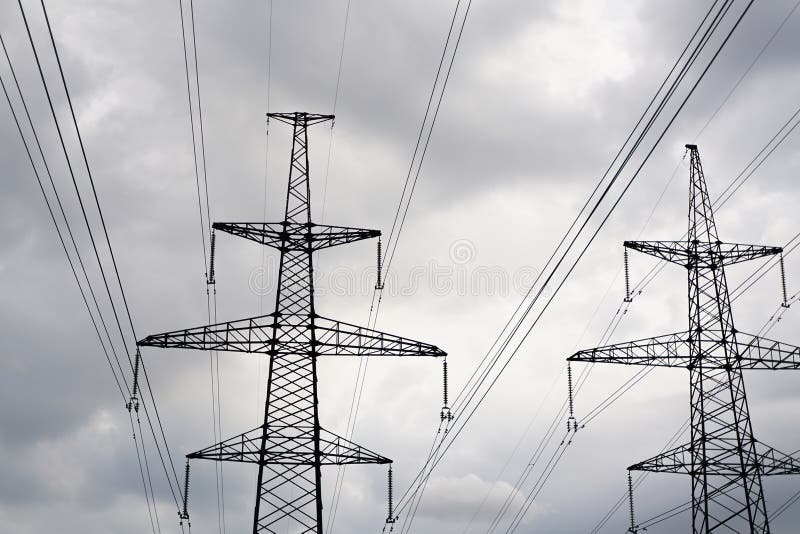 Power Transmission Line in the City with Cloudy Sky Stock Image - Image ...