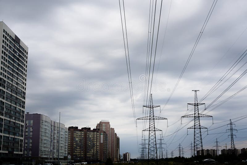Power Transmission Line in the City with Cloudy Sky Stock Photo - Image ...