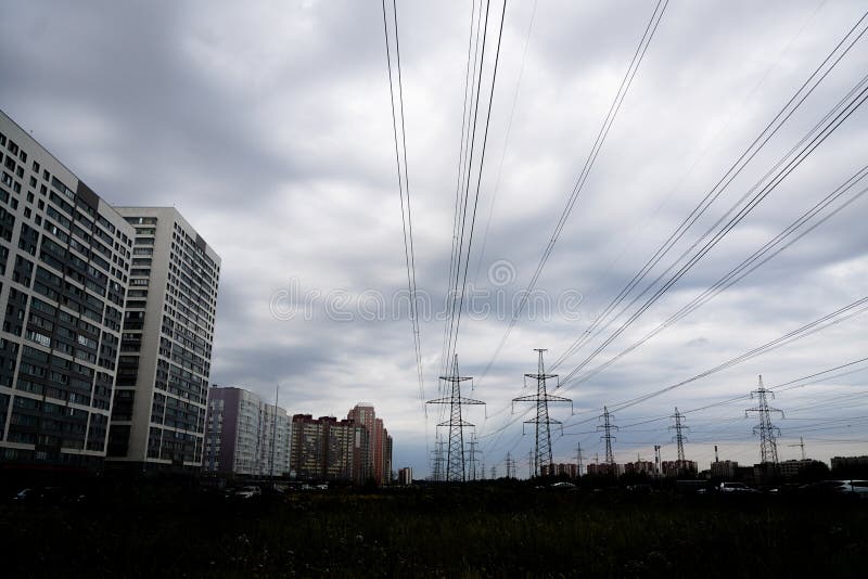 Power Transmission Line in the City with Cloudy Sky Stock Image - Image ...