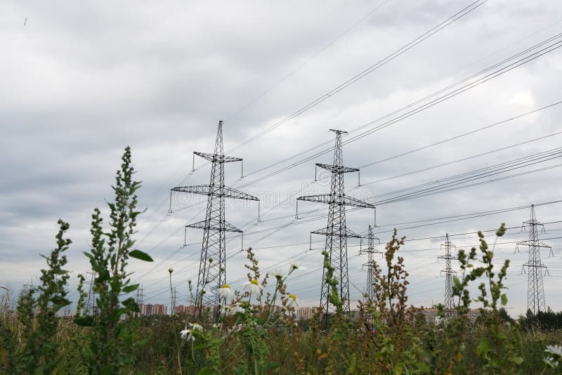 Power Transmission Line in the City with Cloudy Sky Stock Image - Image ...