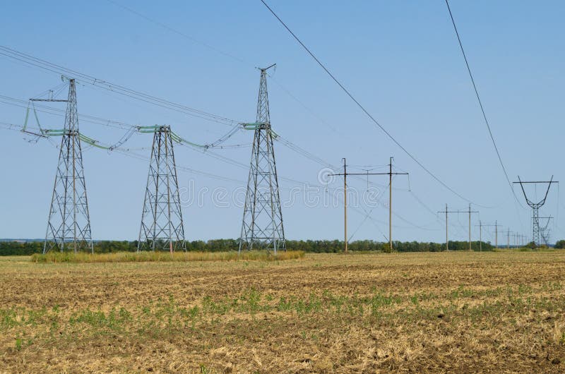 Power Transmission Line Support are in the Field Stock Photo - Image of ...