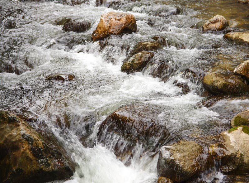 The Power of Water Crosing between the Rocks Stock Photo - Image of ...
