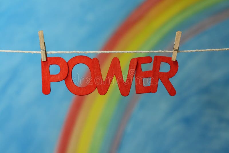 The Word Power with a Rainbow and Blue Sky Background. Stock Photo ...