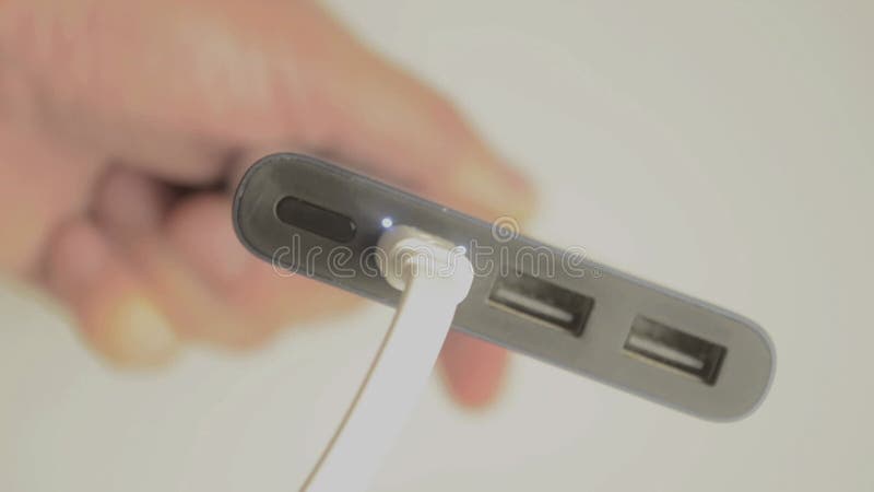 The Powerbank is Charging.the Charge Indicator Flashes Stock Video ...