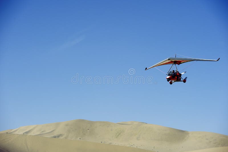 Powered Glider Flying Above the Desert Stock Image - Image of exciting ...