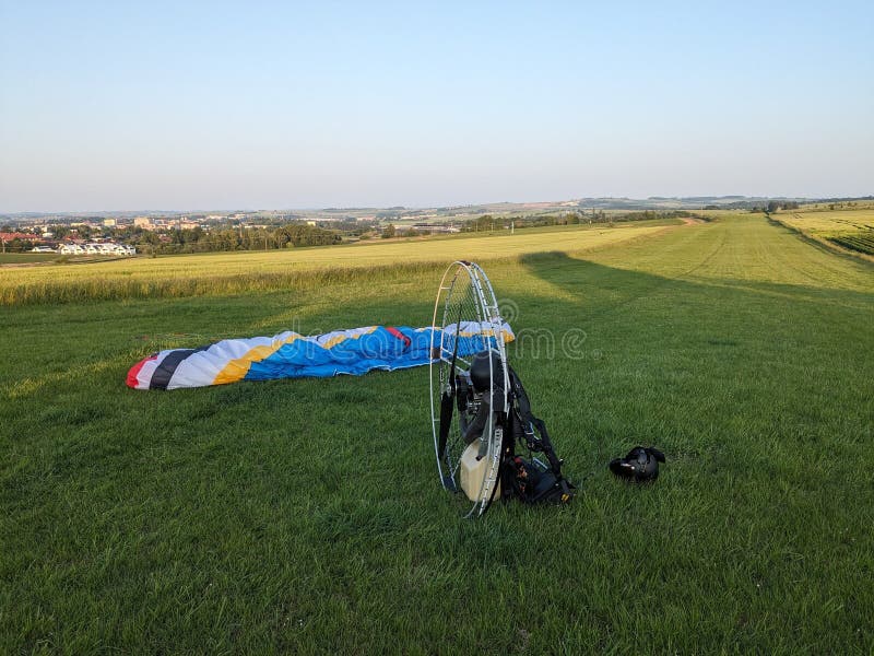 Powered Paraglider Wing and Paramotor Engine on Grass Field after ...