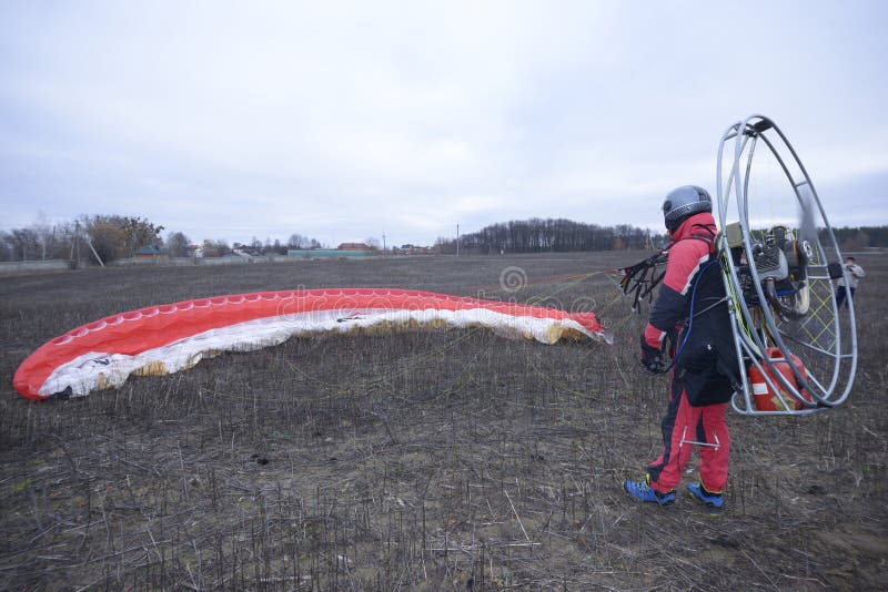 Powered Paragliding. Man Paramotorist Making Preparations for Flight ...