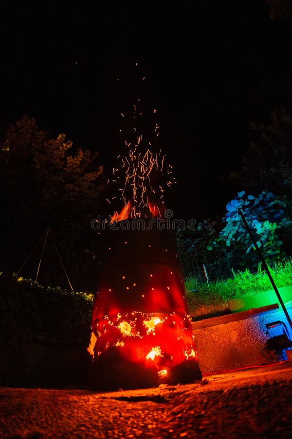 Powerful Bonfire in a Barrel at an Event Glowing and Sparking in the ...
