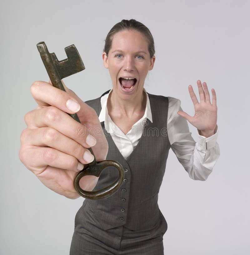 Powerful Businesswoman Holding Key of Success Stock Image - Image of ...