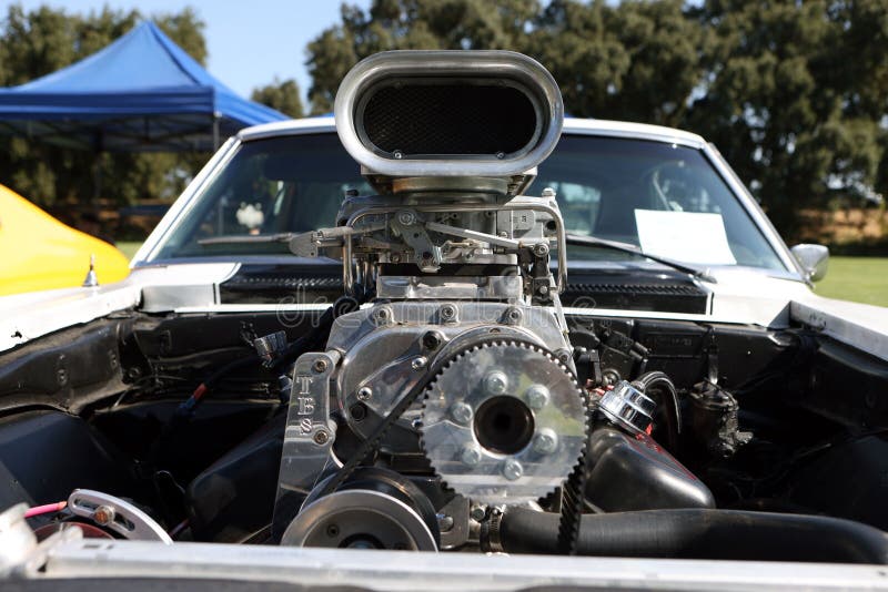Powerful Car Engine with a Supercharger at an Outdoor Car Show in ...