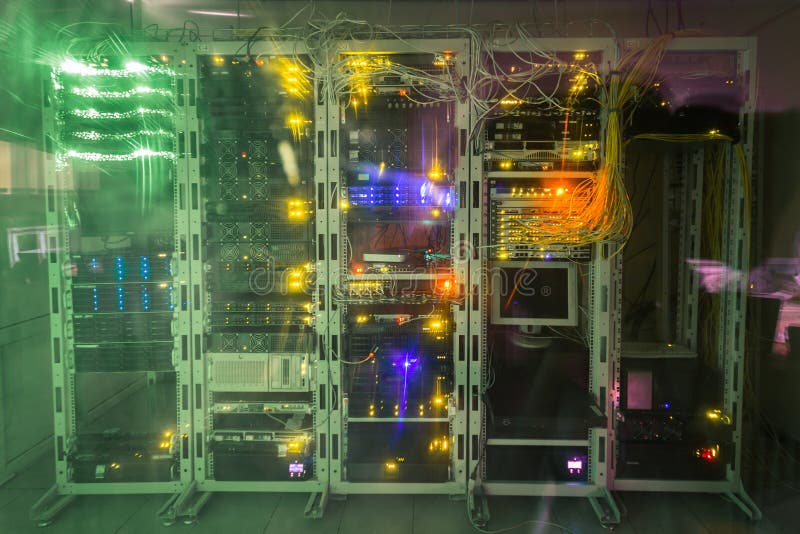 Powerful Computer Equipment Works in a Dark Server Room. Racks with ...