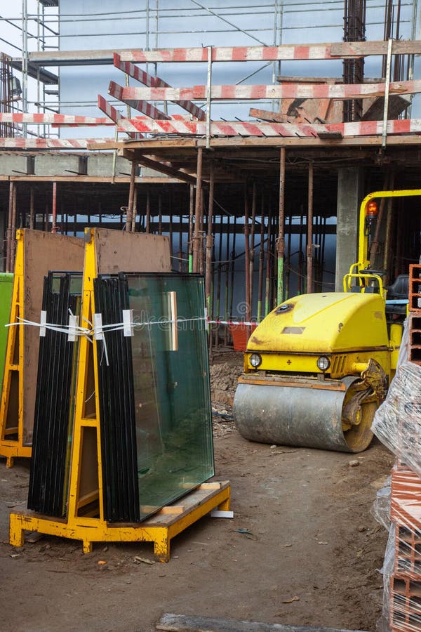 Powerful Construction Compactor at Work, Shaping the Foundation with ...