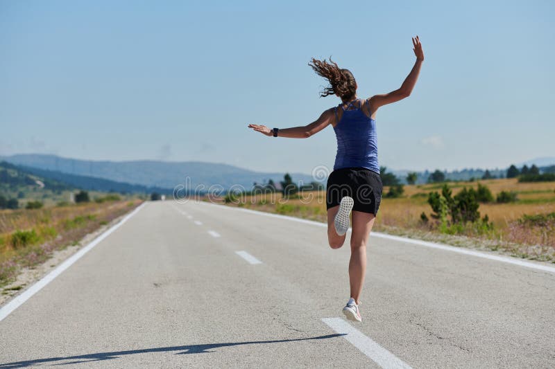 Leap of Victory: Athlete Symbolizes Success and Dedication through Mid ...