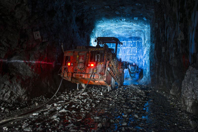 Jumbo machine drilling. stock photo. Image of jumbo - 308132406