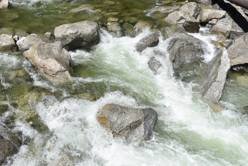 Powerful Flowing River Full of Rocks in the Park in Spring Stock Photo ...