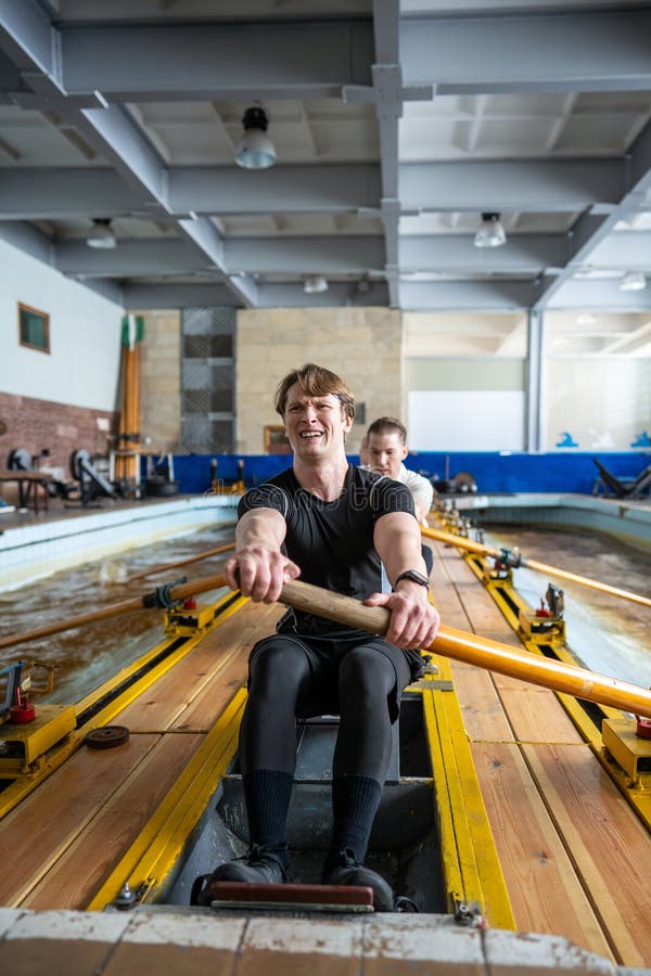 Dedicated Male Rowing Crew Practices Synchronization, Paddling ...