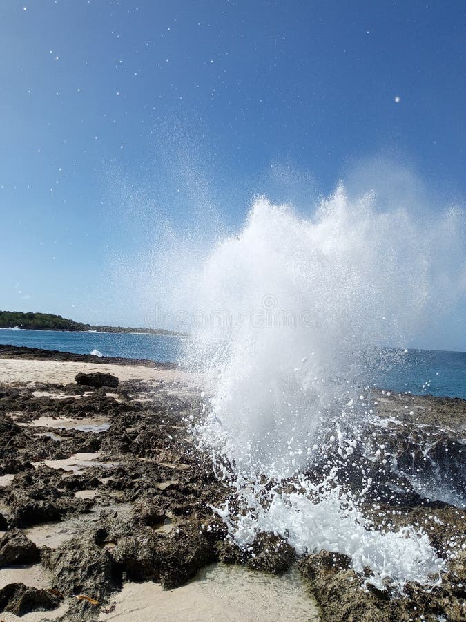 A Geyser Comes Out of the Rocks Stock Image - Image of ocean, cloud ...