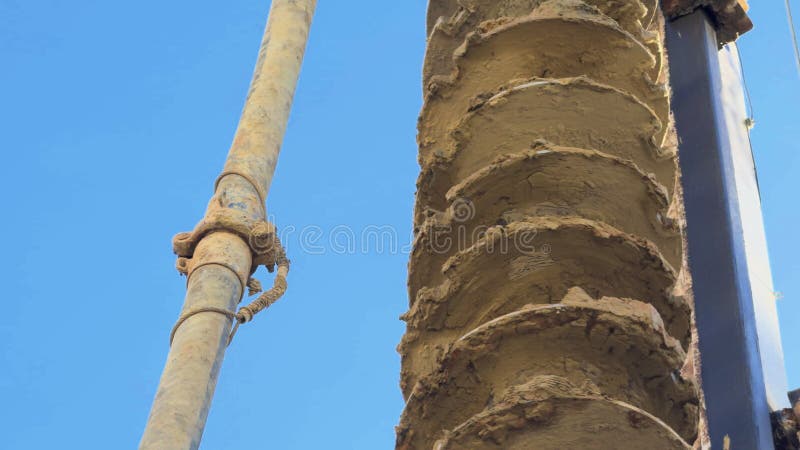 Powerful Ground Drilling for Building Foundations Under Blue Sky Stock ...