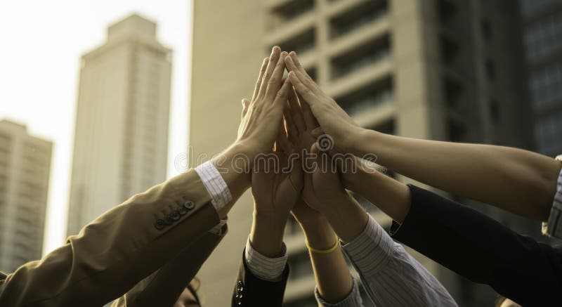 Teamwork Success: Diverse Hands United in City Skyline Stock ...