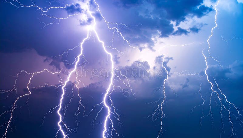 Powerful Lightning Strikes Illuminate a Dramatic Dark Sky during a ...
