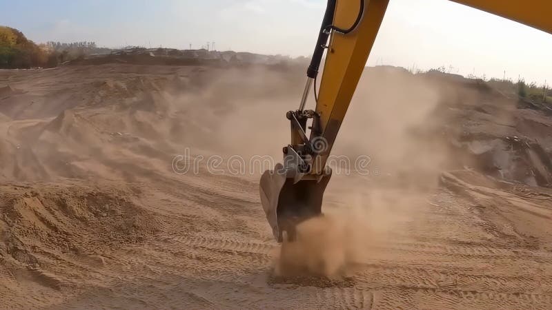 Excavator Pushing Sand in a Construction Site Creating Dust Cloud Stock ...